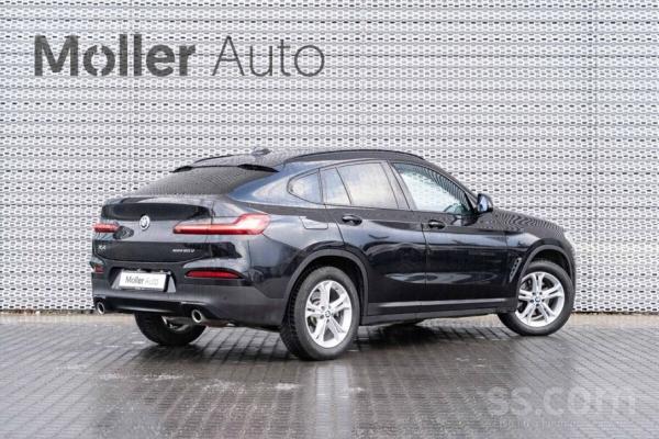 Black BMW X4 2019 in Riga, with an engine capacity of 2.00 L and mileage of 126 thousand km for 28250 €, photo 4 on AUTOMOTO.COM.LV