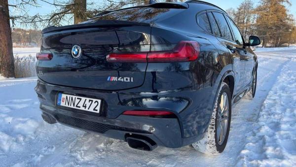 Black BMW X4 2019 in Vilnius, with an engine capacity of 3.00 L and mileage of 99 thousand km for 33300 €, photo 4 on AUTOMOTO.COM.LV