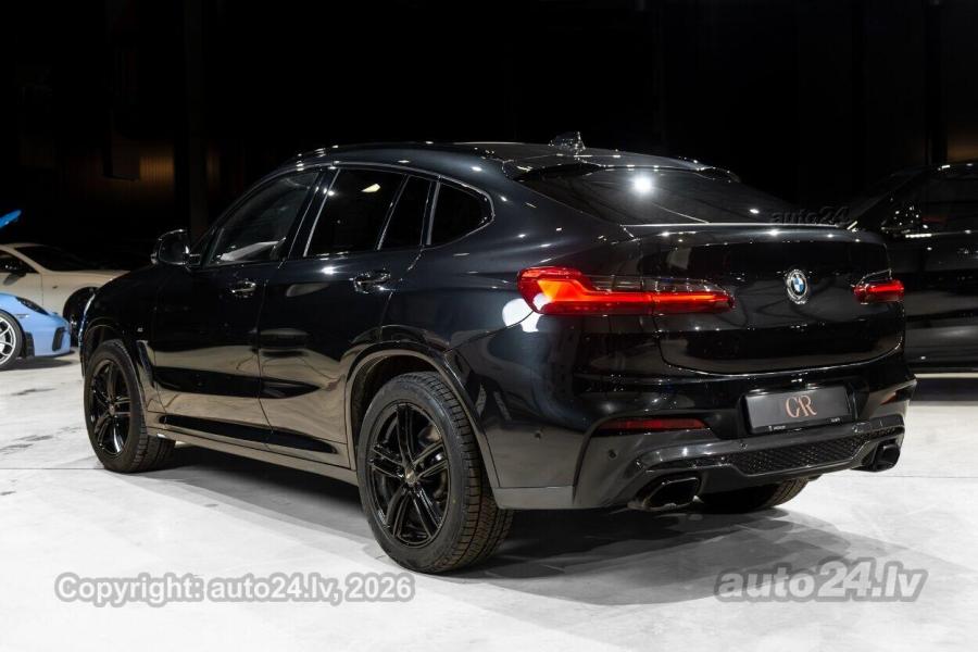 Black BMW X4 2019 in Riga, with an engine capacity of 3.00 L and mileage of 156 thousand km for 33900 €, photo 6 on AUTOMOTO.COM.LV