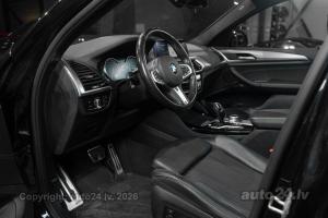 Black BMW X4 2019 in Riga, with an engine capacity of 3.00 L and mileage of 156 thousand km for 33900 €, photo 8 on AUTOMOTO.COM.LV