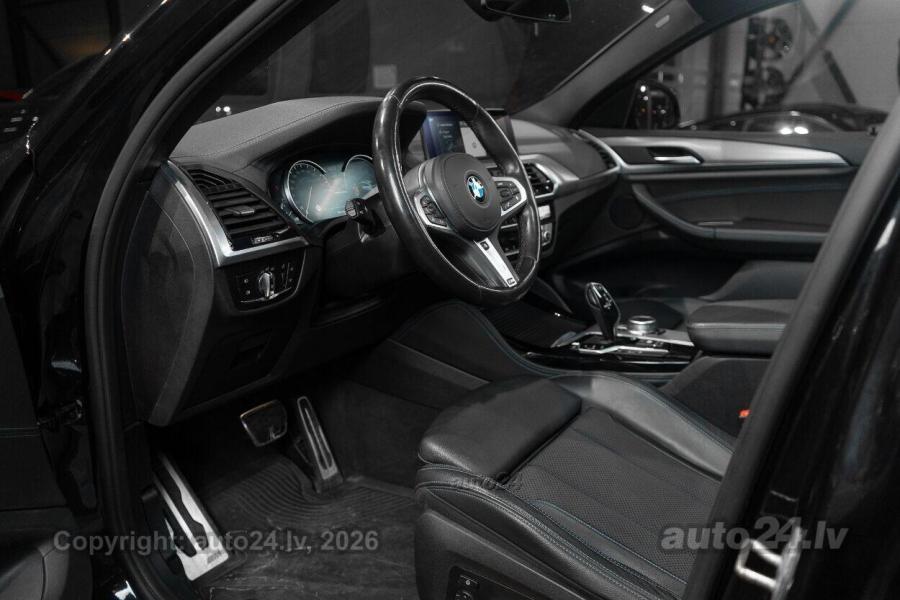 Black BMW X4 2019 in Riga, with an engine capacity of 3.00 L and mileage of 156 thousand km for 33900 €, photo 8 on AUTOMOTO.COM.LV