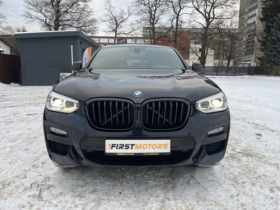 Black BMW X4 2019 in Riga, with an engine capacity of 2.00 L and mileage of 168 thousand km for 27950 €, photo 5 on AUTOMOTO.COM.LV
