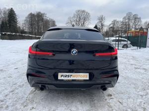 Black BMW X4 2019 in Riga, with an engine capacity of 2.00 L and mileage of 168 thousand km for 27950 €, photo 6 on AUTOMOTO.COM.LV