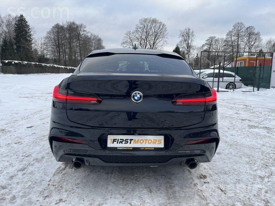 Black BMW X4 2019 in Riga, with an engine capacity of 2.00 L and mileage of 168 thousand km for 27950 €, photo 6 on AUTOMOTO.COM.LV