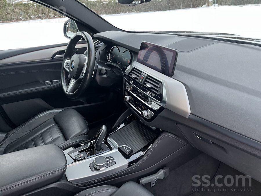 Black BMW X4 2019 in Riga, with an engine capacity of 2.00 L and mileage of 168 thousand km for 27950 €, photo 9 on AUTOMOTO.COM.LV