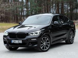 Black BMW X4 2019 in Riga, with an engine capacity of 3.00 L and mileage of 182 thousand km for 29960 €, photo 3 on AUTOMOTO.COM.LV