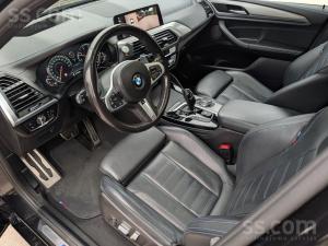 Black BMW X4 2019 in Riga, with an engine capacity of 3.00 L and mileage of 182 thousand km for 29960 €, photo 9 on AUTOMOTO.COM.LV