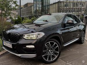 Black BMW X4 2019 in Vilnius, with an engine capacity of 2.00 L and mileage of 290 thousand km for 17900 €, photo  on AUTOMOTO.COM.LV