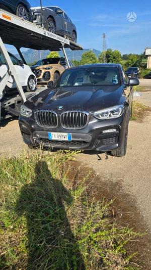 Black BMW X4 2019 in Siauliai, with an engine capacity of 2.00 L and mileage of 170 thousand km for 17300 €, photo  on AUTOMOTO.COM.LV