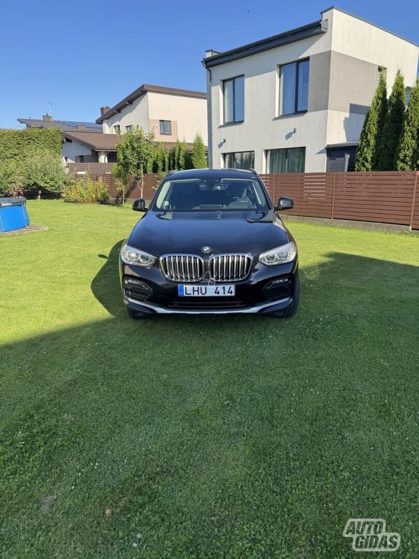 Black BMW X4 2019 in Kaunas, with an engine capacity of 2.00 L and mileage of 98 thousand km for 40000 €, photo 1 on AUTOMOTO.COM.LV