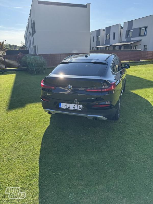Black BMW X4 2019 in Kaunas, with an engine capacity of 2.00 L and mileage of 98 thousand km for 40000 €, photo 3 on AUTOMOTO.COM.LV