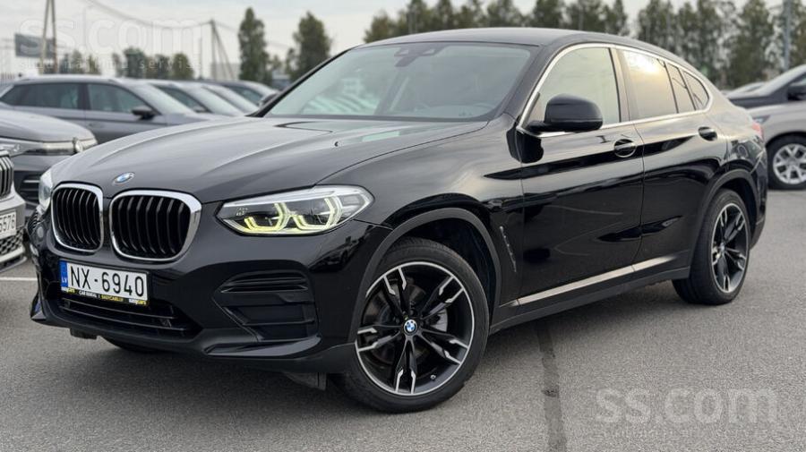 Black BMW X4 2019 in Riga, with an engine capacity of 2.00 L and mileage of 97 thousand km for 25490 €, photo 4 on AUTOMOTO.COM.LV