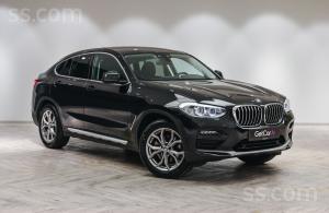 Black BMW X4 2020 in Riga, with an engine capacity of 2.00 L and mileage of 198 thousand km for 24900 €, photo 2 on AUTOMOTO.COM.LV