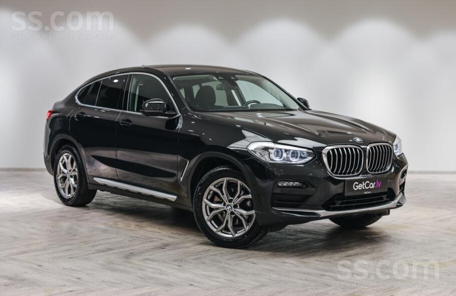 Black BMW X4 2020 in Riga, with an engine capacity of 2.00 L and mileage of 198 thousand km for 24900 €, photo 2 on AUTOMOTO.COM.LV