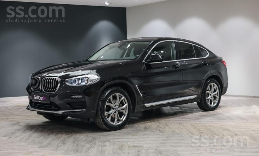 Black BMW X4 2020 in Riga, with an engine capacity of 2.00 L and mileage of 198 thousand km for 24900 €, photo 5 on AUTOMOTO.COM.LV