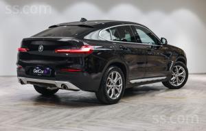 Black BMW X4 2020 in Riga, with an engine capacity of 2.00 L and mileage of 198 thousand km for 24900 €, photo 6 on AUTOMOTO.COM.LV
