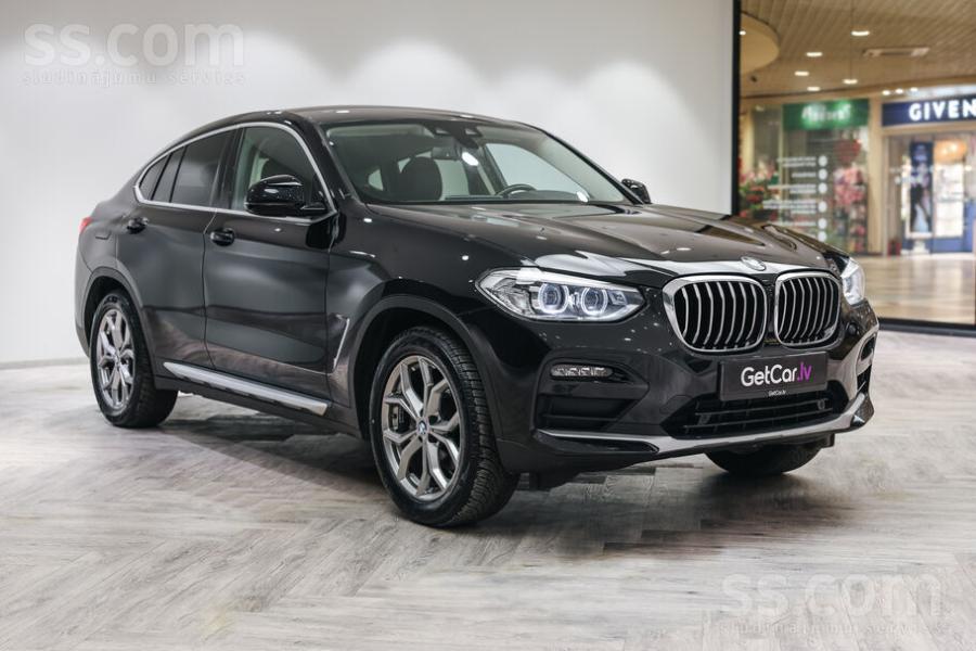 Black BMW X4 2020 in Riga, with an engine capacity of 2.00 L and mileage of 198 thousand km for 24900 €, photo 8 on AUTOMOTO.COM.LV