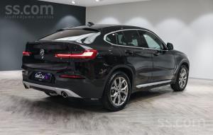 Black BMW X4 2020 in Riga, with an engine capacity of 2.00 L and mileage of 198 thousand km for 24900 €, photo 9 on AUTOMOTO.COM.LV