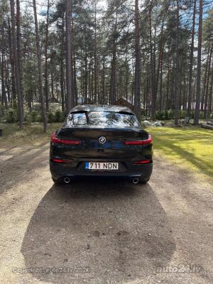 Black BMW X4 2020 in Tallinn, with an engine capacity of 2.00 L and mileage of 112 thousand km for 38000 €, photo 4 on AUTOMOTO.COM.LV