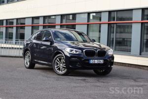 Black BMW X4 2020 in Riga, with an engine capacity of 2.00 L and mileage of 52 thousand km for 32480 €, photo  on AUTOMOTO.COM.LV