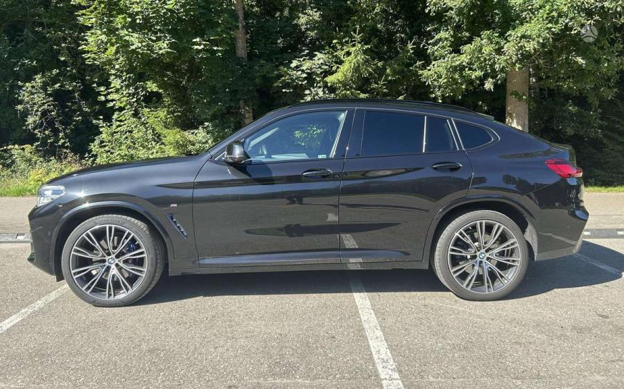 Black BMW X4 2020 in Klaipeda, with an engine capacity of 2.99 L and mileage of 86 thousand km for 38900 €, photo 7 on AUTOMOTO.COM.LV