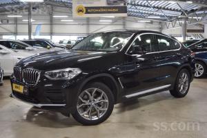 Black BMW X4 2021 in Riga, with an engine capacity of 2.00 L and mileage of 108 thousand km for 33500 €, photo  on AUTOMOTO.COM.LV