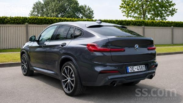 Black BMW X4 2021 in Riga, with an engine capacity of 2.00 L and mileage of 127 thousand km for 36900 €, photo 7 on AUTOMOTO.COM.LV