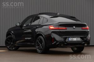 Black BMW X4 2022 in Jelgava, with an engine capacity of 2.00 L and mileage of 0 thousand km for 36500 €, photo 5 on AUTOMOTO.COM.LV