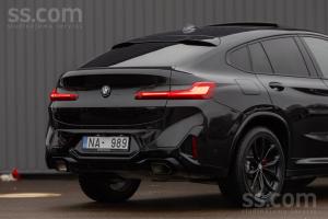 Black BMW X4 2022 in Jelgava, with an engine capacity of 2.00 L and mileage of 0 thousand km for 36500 €, photo 8 on AUTOMOTO.COM.LV