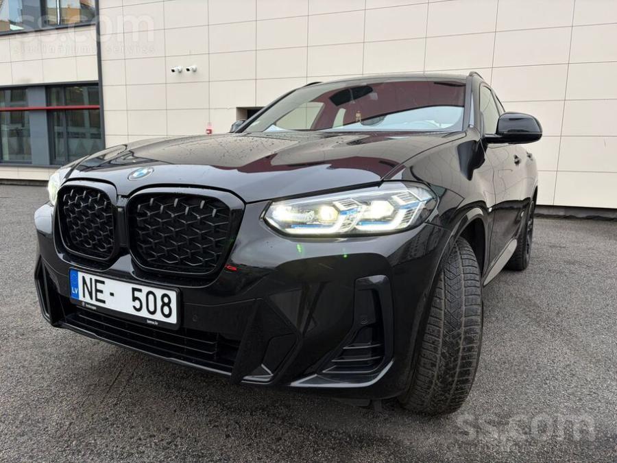 Black BMW X4 2022 in Riga, with an engine capacity of 2.00 L and mileage of 60 thousand km for 43000 €, photo 1 on AUTOMOTO.COM.LV
