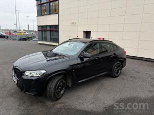 Black BMW X4 2022 in Riga, with an engine capacity of 2.00 L and mileage of 60 thousand km for 43000 €, photo 2 on AUTOMOTO.COM.LV