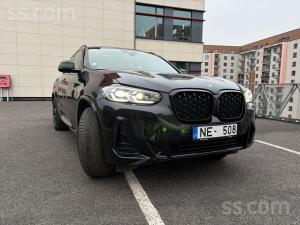 Black BMW X4 2022 in Riga, with an engine capacity of 2.00 L and mileage of 60 thousand km for 43000 €, photo 4 on AUTOMOTO.COM.LV