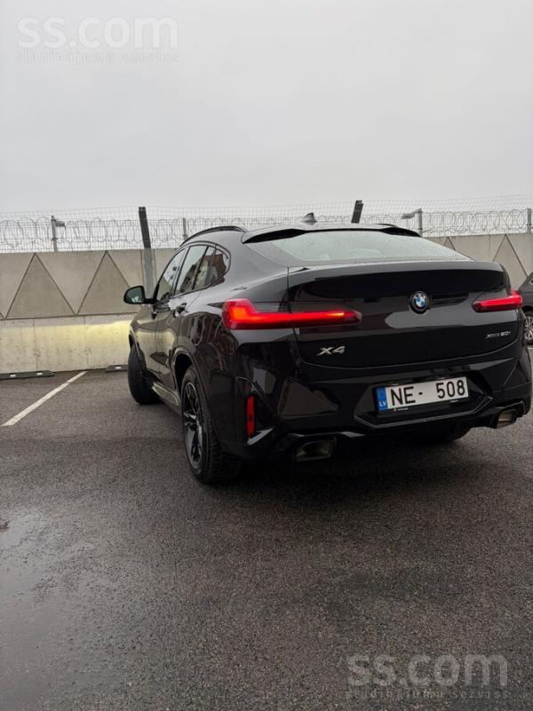 Black BMW X4 2022 in Riga, with an engine capacity of 2.00 L and mileage of 60 thousand km for 43000 €, photo 8 on AUTOMOTO.COM.LV