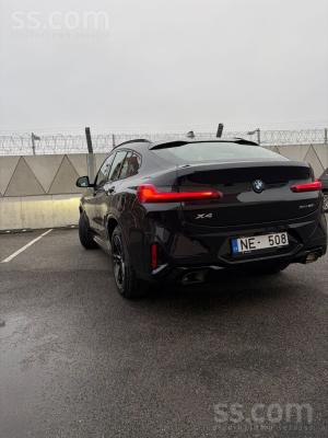 Black BMW X4 2022 in Riga, with an engine capacity of 2.00 L and mileage of 60 thousand km for 43000 €, photo 8 on AUTOMOTO.COM.LV
