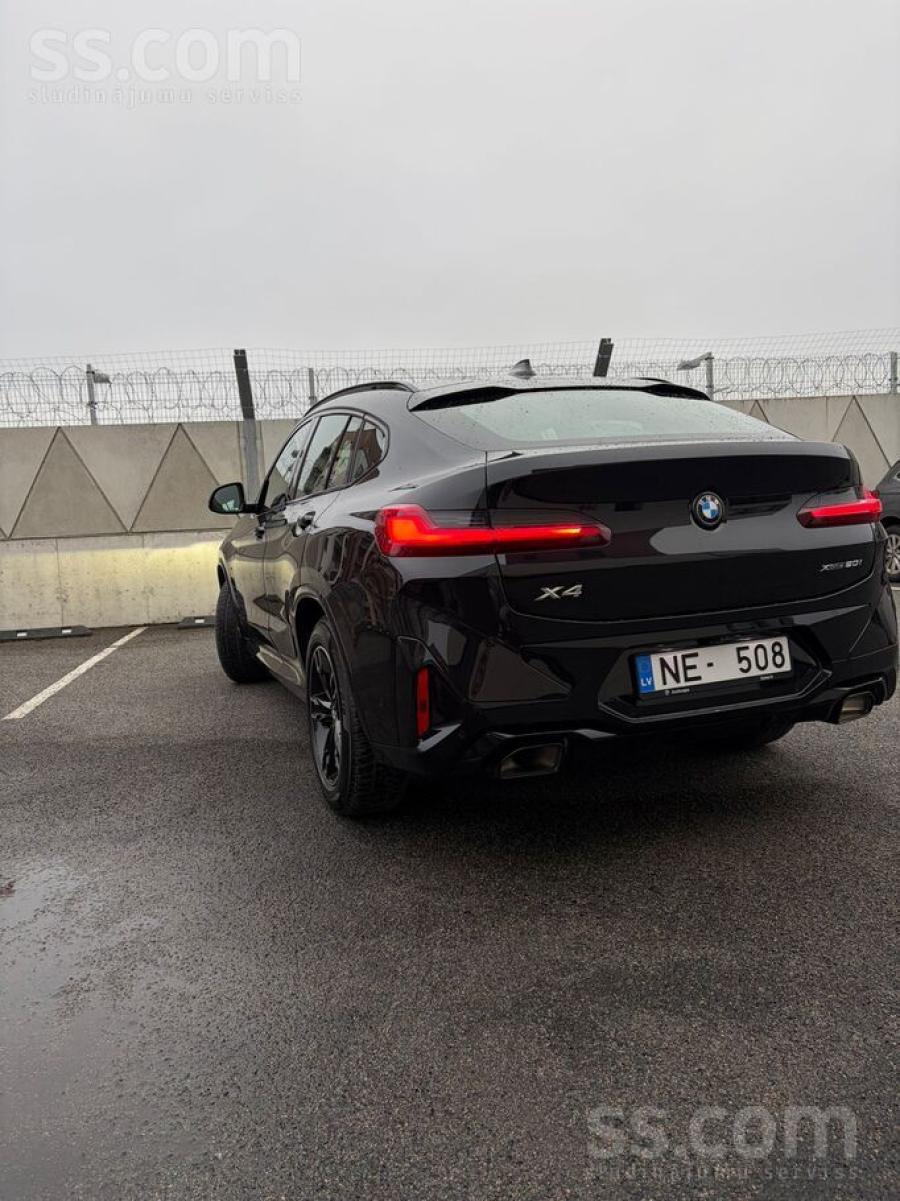 Black BMW X4 2022 in Riga, with an engine capacity of 2.00 L and mileage of 60 thousand km for 43000 €, photo 8 on AUTOMOTO.COM.LV