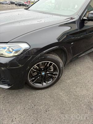 Black BMW X4 2022 in Riga, with an engine capacity of 2.00 L and mileage of 60 thousand km for 43000 €, photo 12 on AUTOMOTO.COM.LV