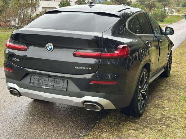 Black BMW X4 2022 in Vilnius, with an engine capacity of 2.99 L and mileage of 74 thousand km for 13900 €, photo 1 on AUTOMOTO.COM.LV