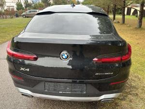 Black BMW X4 2022 in Vilnius, with an engine capacity of 2.99 L and mileage of 74 thousand km for 13900 €, photo 5 on AUTOMOTO.COM.LV