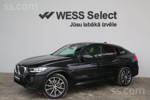 Black BMW X4 2022 in Riga, with an engine capacity of 2.00 L and mileage of 134 thousand km for 37500 €, photo 1 on AUTOMOTO.COM.LV