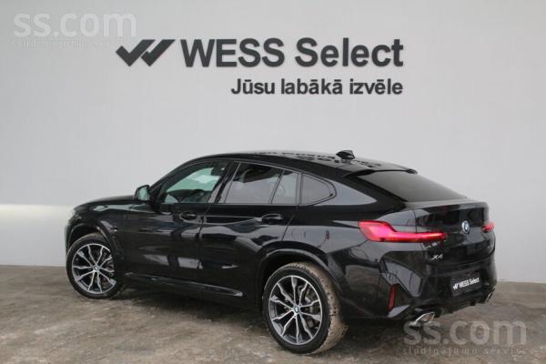 Black BMW X4 2022 in Riga, with an engine capacity of 2.00 L and mileage of 134 thousand km for 37500 €, photo 4 on AUTOMOTO.COM.LV