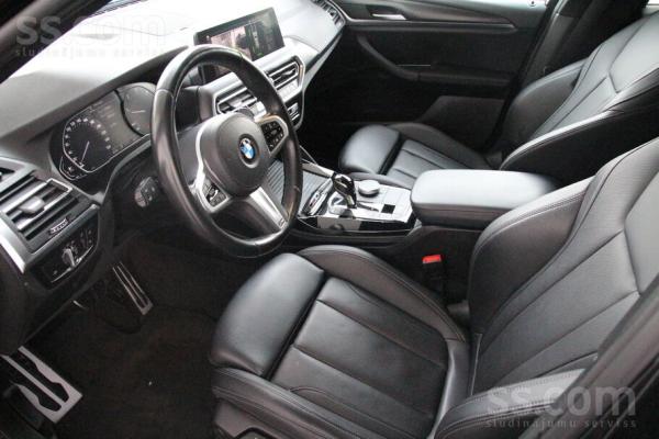 Black BMW X4 2022 in Riga, with an engine capacity of 2.00 L and mileage of 134 thousand km for 37500 €, photo 5 on AUTOMOTO.COM.LV