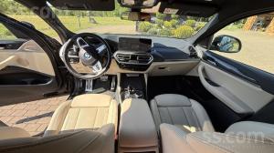 Black BMW X4 2022 in Riga, with an engine capacity of 2.00 L and mileage of 100 thousand km for 35500 €, photo 4 on AUTOMOTO.COM.LV