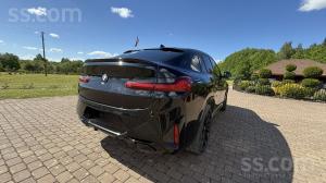 Black BMW X4 2022 in Riga, with an engine capacity of 2.00 L and mileage of 100 thousand km for 35500 €, photo 8 on AUTOMOTO.COM.LV