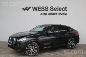 Black BMW X4 2022 in Riga, with an engine capacity of 2.00 L and mileage of 134 thousand km for 34900 €, photo  on AUTOMOTO.COM.LV