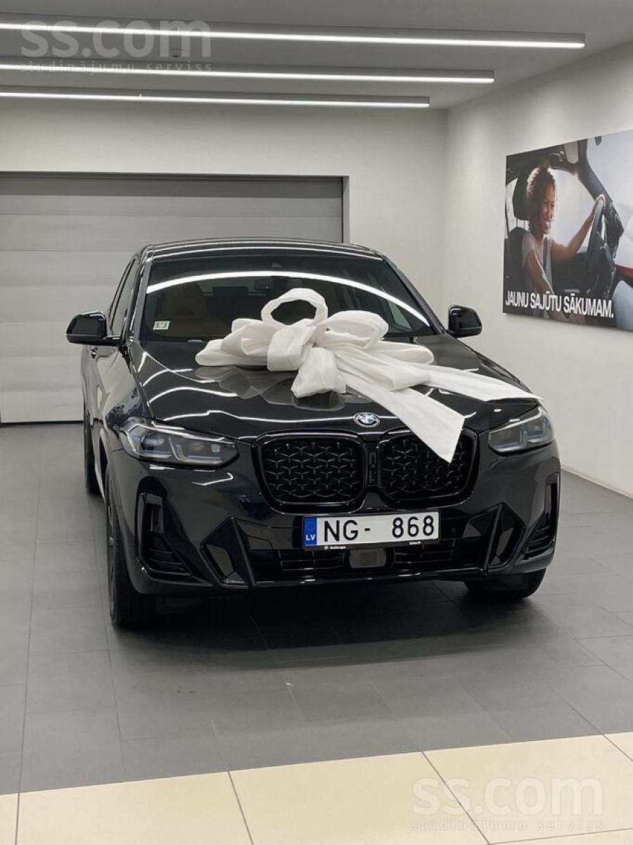 Black BMW X4 2022 in Riga, with an engine capacity of 3.00 L and mileage of 66 thousand km for 51500 €, photo 1 on AUTOMOTO.COM.LV