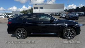 Black BMW X4 2023 in Tallinn, with an engine capacity of 2.00 L and mileage of 99 thousand km for 48000 €, photo 4 on AUTOMOTO.COM.LV