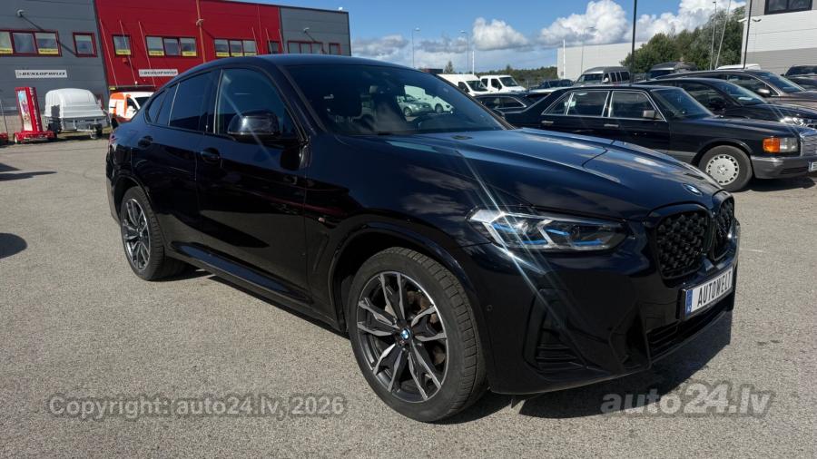 Black BMW X4 2023 in Tallinn, with an engine capacity of 2.00 L and mileage of 99 thousand km for 48000 €, photo 5 on AUTOMOTO.COM.LV