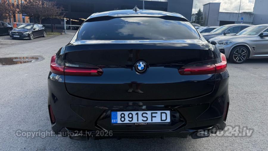 Black BMW X4 2023 in Tallinn, with an engine capacity of 2.00 L and mileage of 99 thousand km for 48000 €, photo 6 on AUTOMOTO.COM.LV