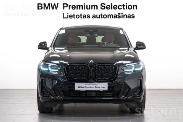 Black BMW X4 2024 in Riga, with an engine capacity of 3.00 L and mileage of 72 thousand km for 52500 €, photo 4 on AUTOMOTO.COM.LV