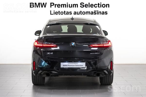 Black BMW X4 2024 in Riga, with an engine capacity of 3.00 L and mileage of 72 thousand km for 52500 €, photo 5 on AUTOMOTO.COM.LV